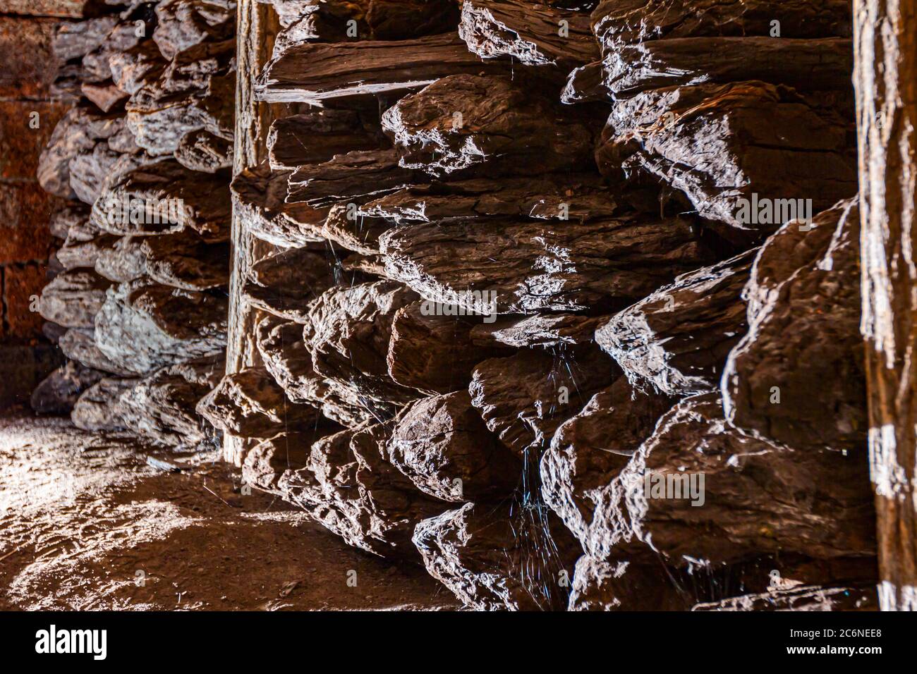 Storage of dry wooden coal, charcoal is piled and ready for ussage ...