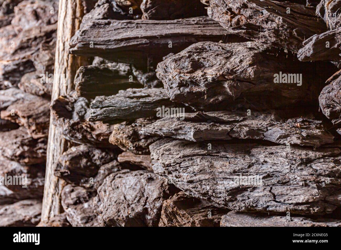 Storage of dry wooden coal, charcoal is piled and ready for ussage ...