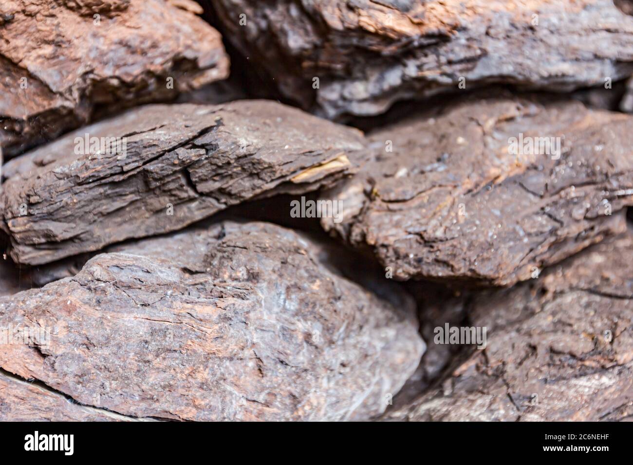 Storage of dry wooden coal, charcoal is piled and ready for ussage ...