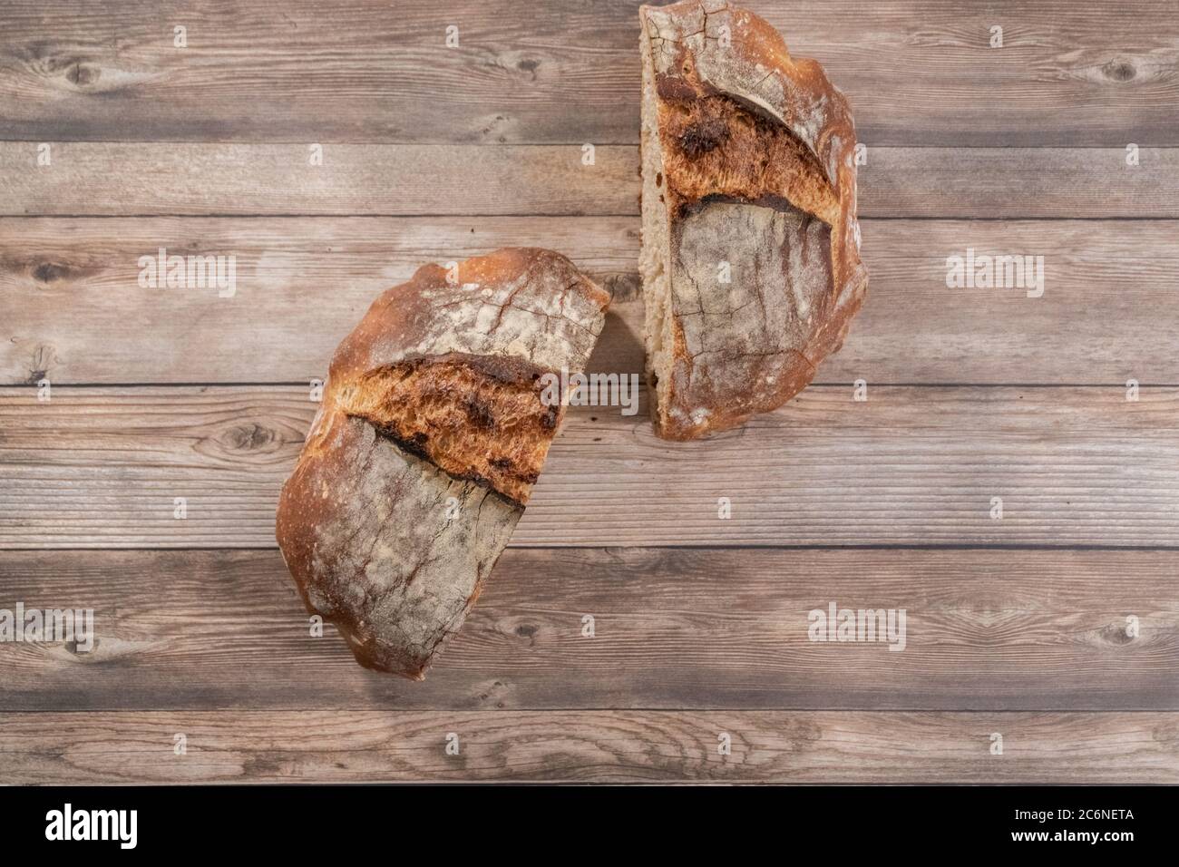 Flat lay. Sliced baked sourdough rye loaf of bread Stock Photo - Alamy
