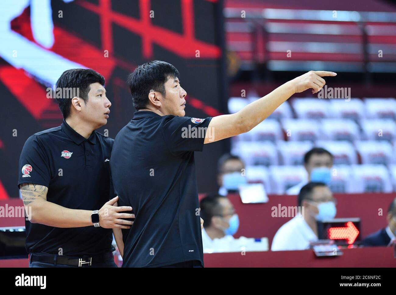 Qingdao, China's Shandong Province. 11th July, 2020. Ding Wei (R), head ...