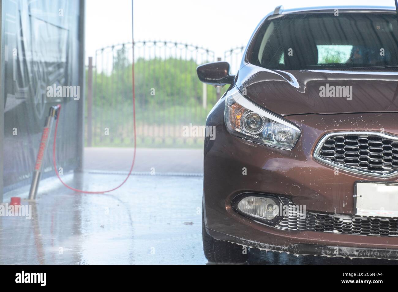 car at the car wash. self-washing machine Stock Photo - Alamy