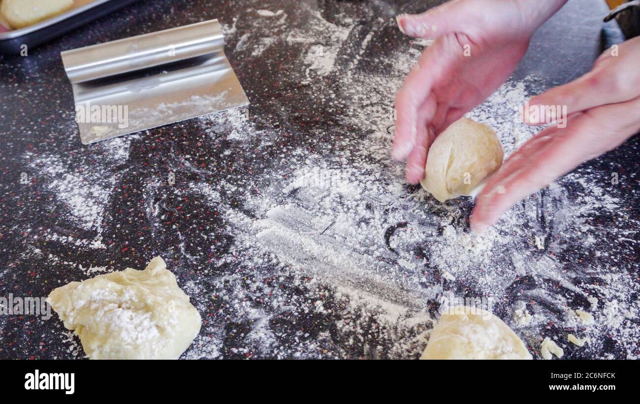 Step by step. Baking sourdough bread in residential kitchen Stock Photo ...