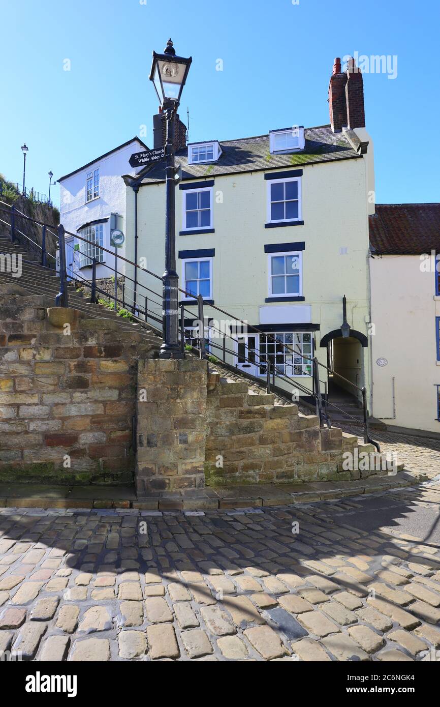 The Famous 199 steps to Whitby Abbey with Blue Sky and a street in the ...