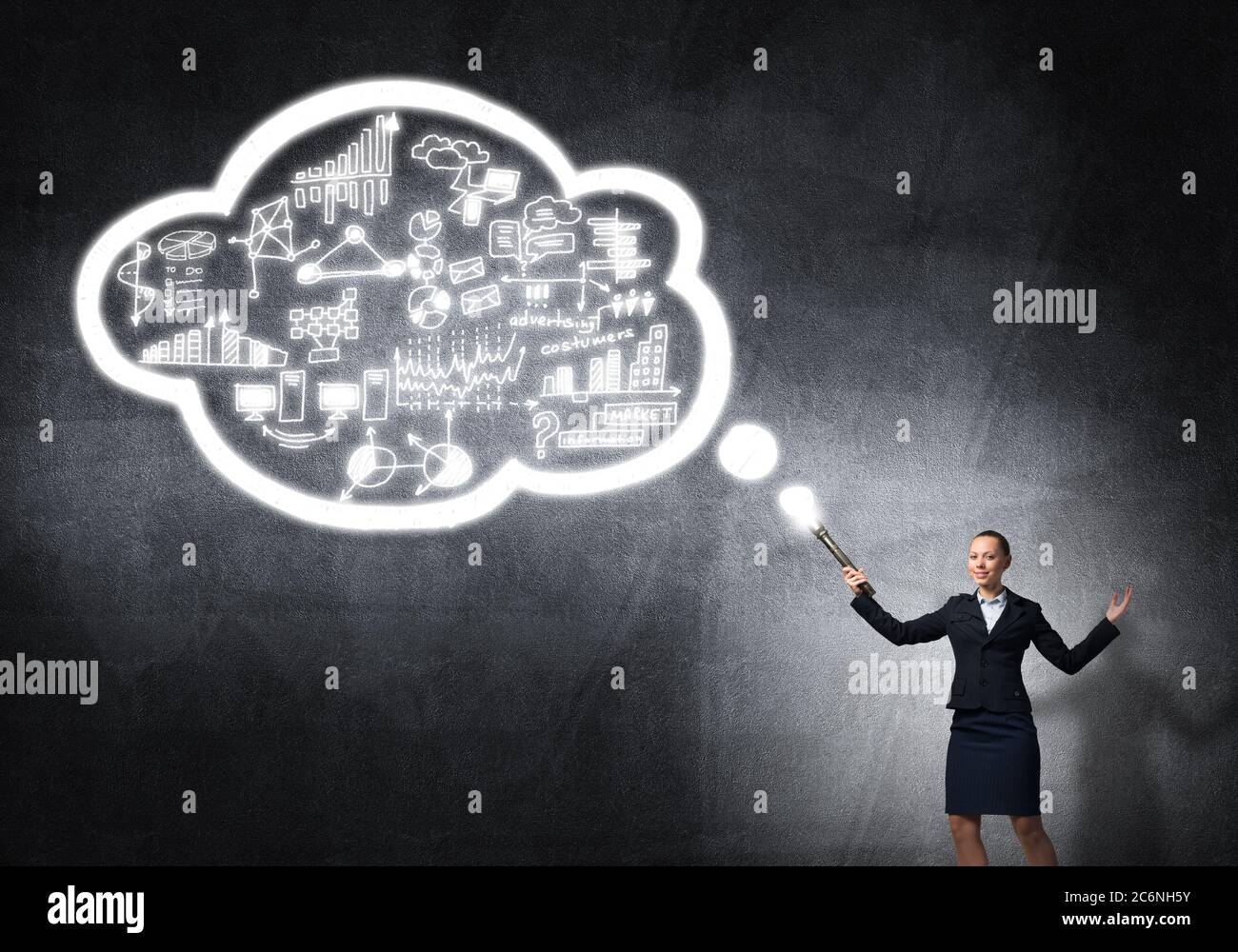 Woman throwing light on her ideas Stock Photo - Alamy