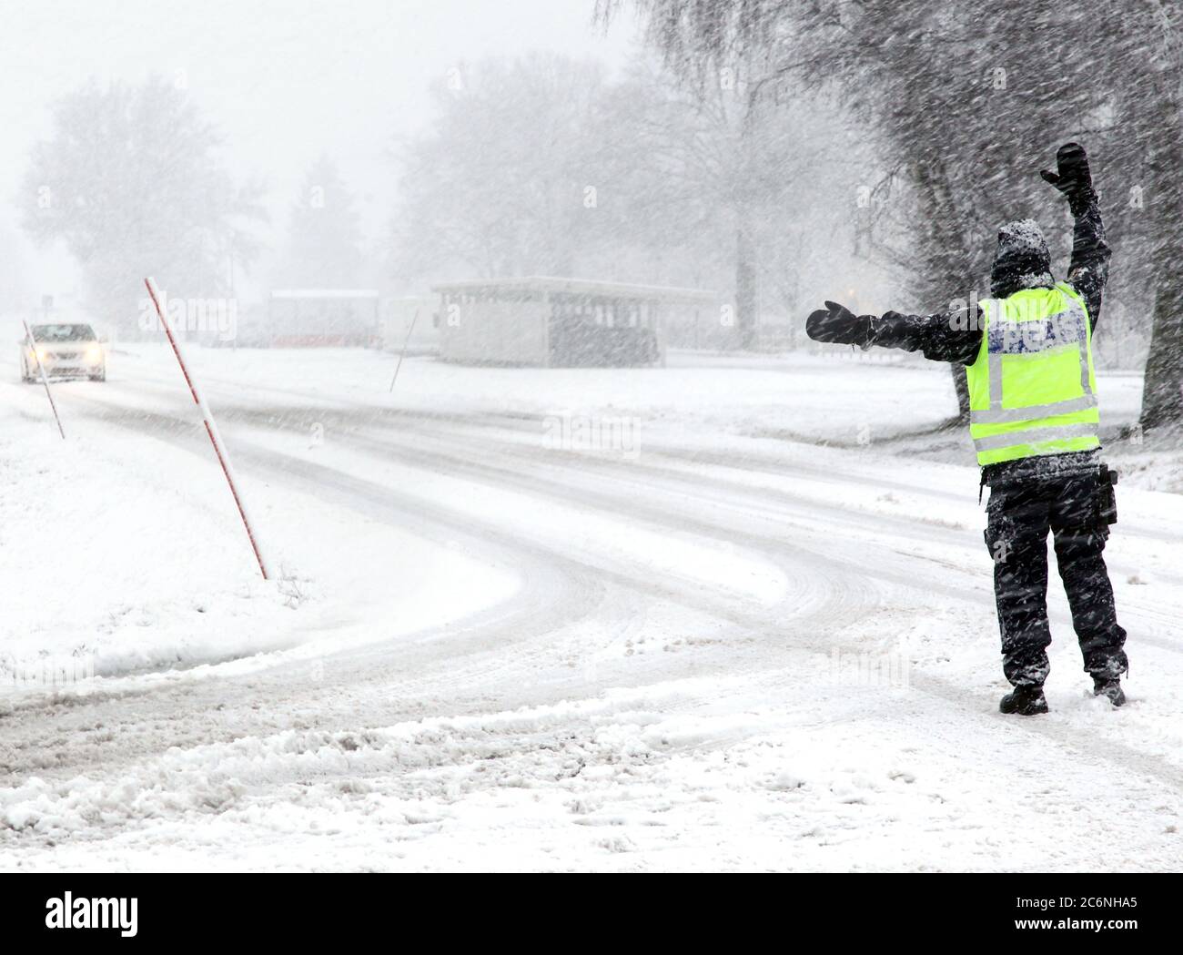 The traffic police have routine checks out in the snowstorm Photo by ...