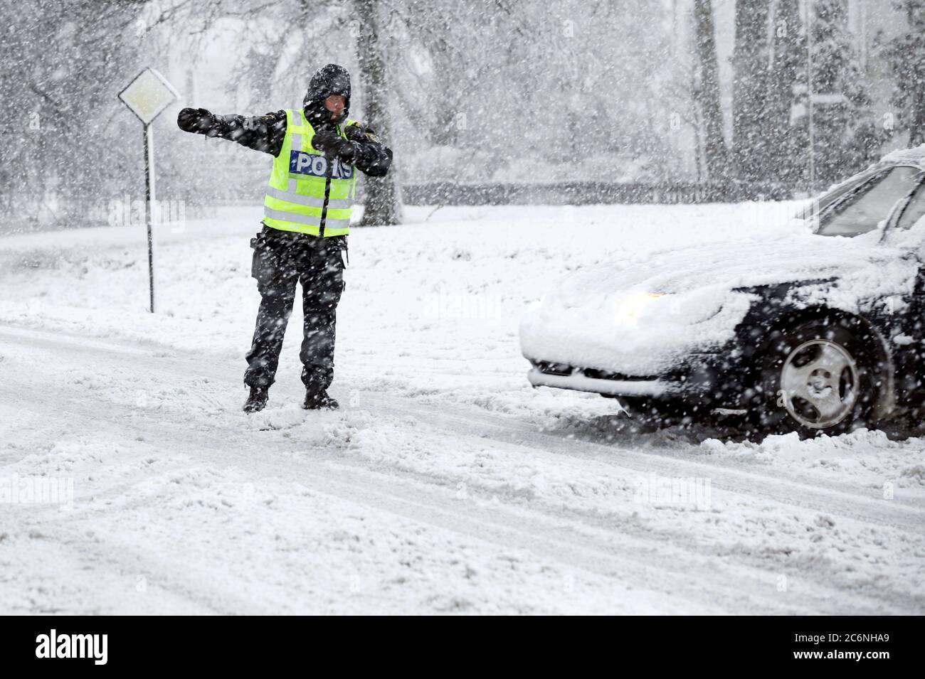The traffic police have routine checks out in the snowstorm Photo by ...