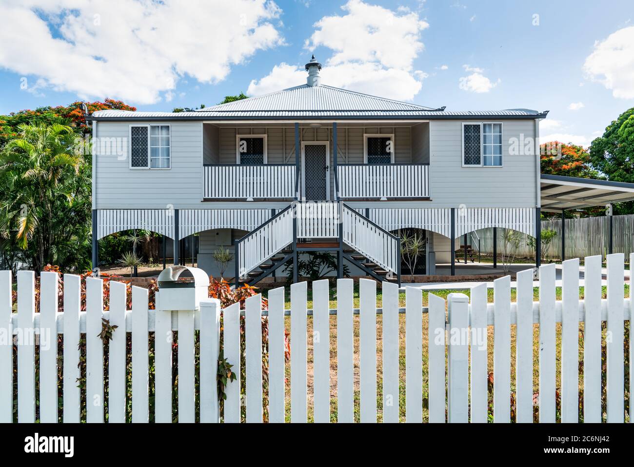 Old high set house after renovation completed with new fence Stock ...