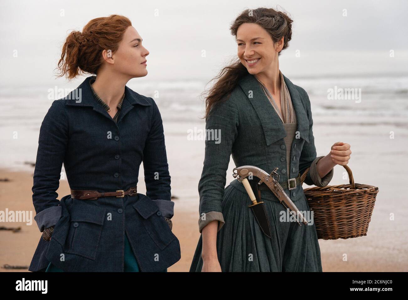 CAITRIONA BALFE and SOPHIE SKELTON in OUTLANDER (2014), directed by ...