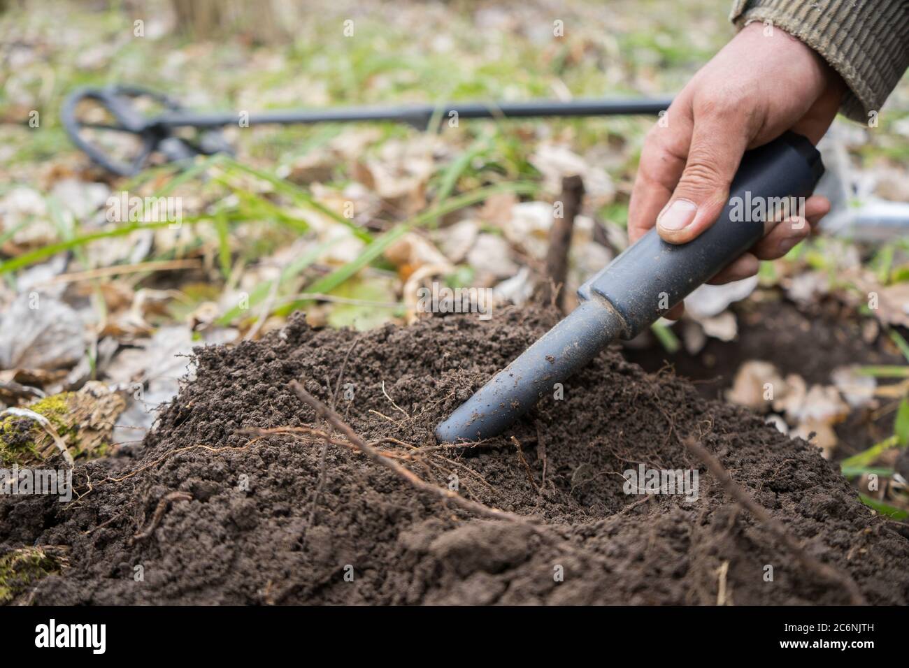 pinpointer metal detector in hand. Search coins with a pinpointer Stock ...