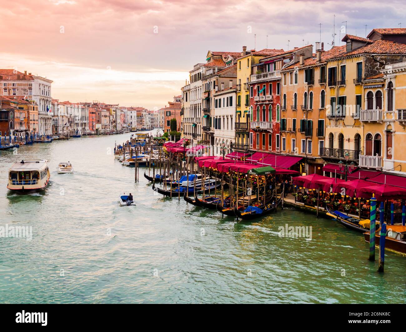 Stunning view of Grand Canal and its colorful palaces at sunset, Venice ...