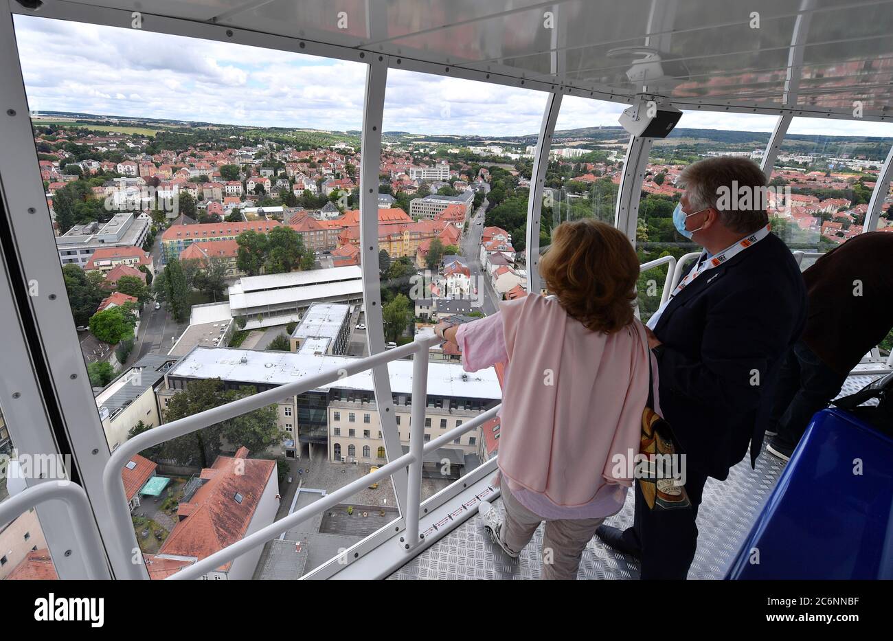 Weimar, Germany. 11th July, 2020. Guests of the premiere ride look out ...