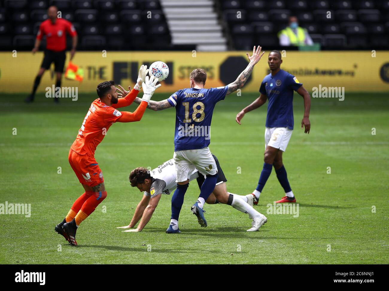 Brentford goalkeeper David Raya Martin (left) makes a save during the ...
