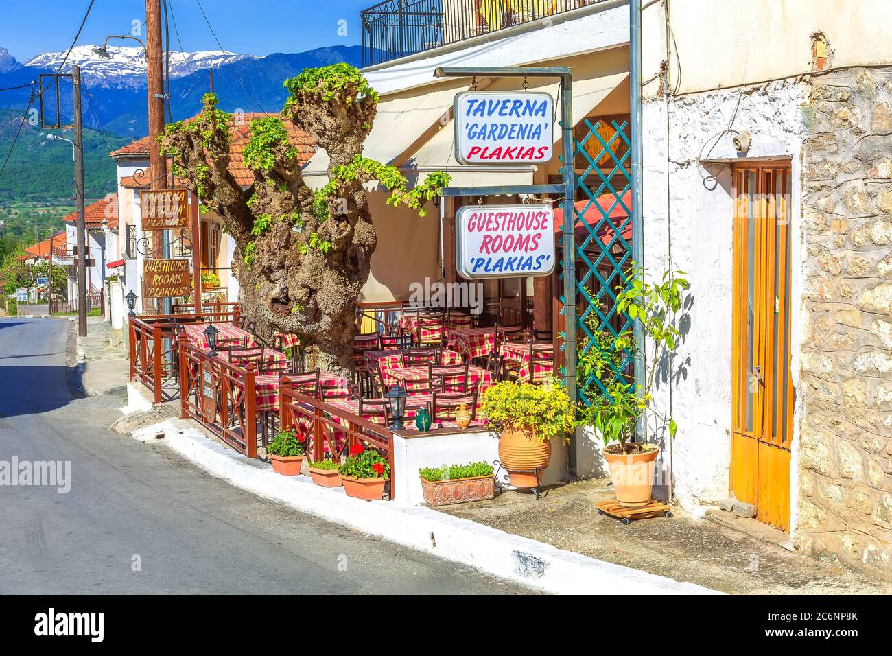 Meteora, Greece - April 27, 2015: Tables and chairs at the traditional ...
