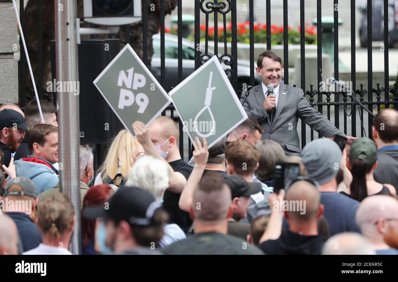 Justin Barrett, leader of the National Party, speaks during a March for ...
