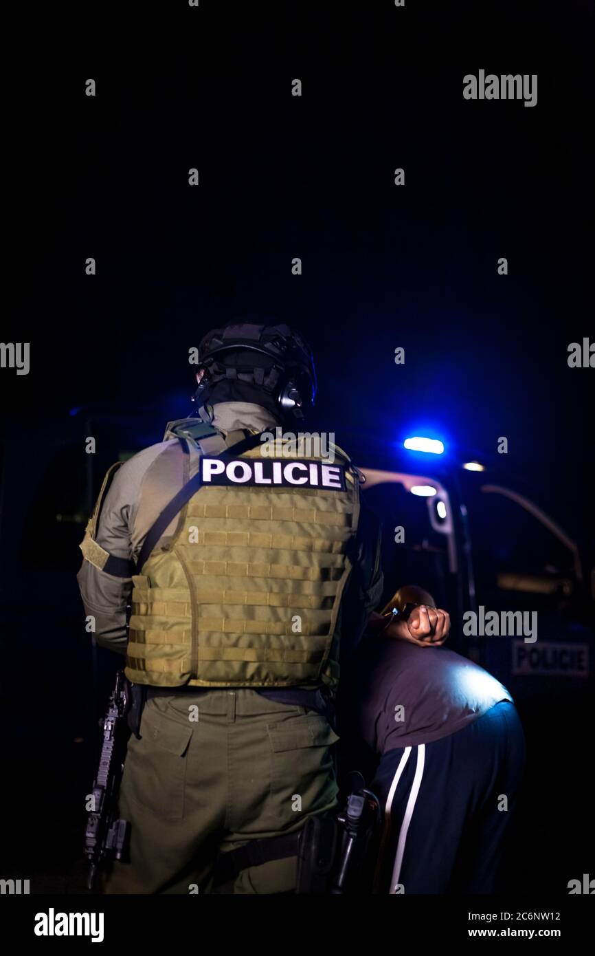 Man handcuffed police car hi-res stock photography and images - Alamy