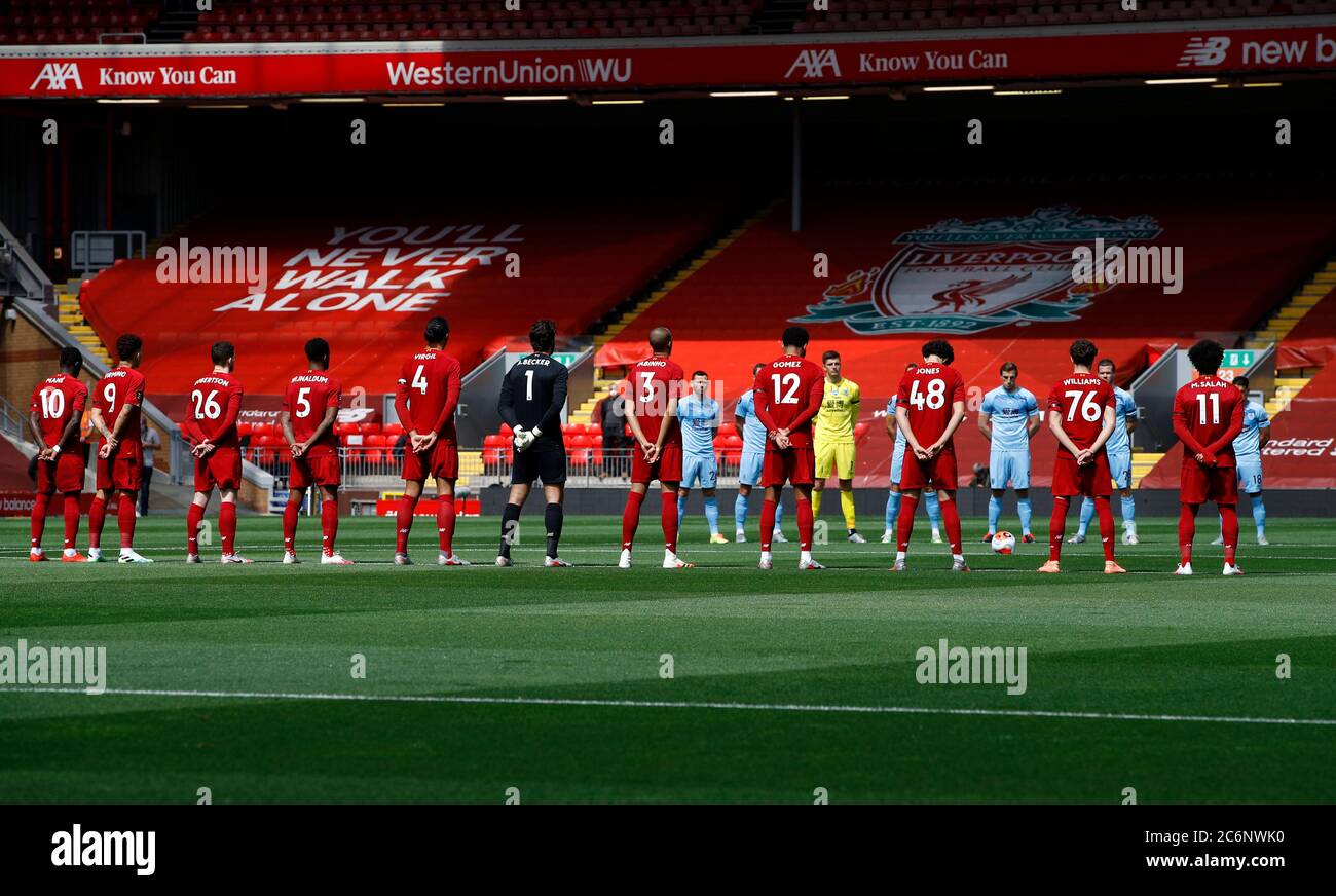Liverpool and Burnley players observe a minute's silence before kick ...