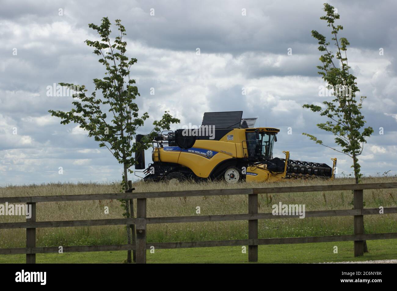 Combine Harvester in field Stock Photo - Alamy