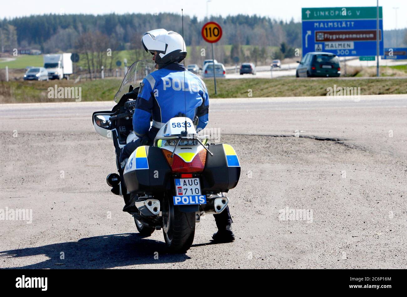 Traffic police, on a police motorcycle, which monitors traffic along ...