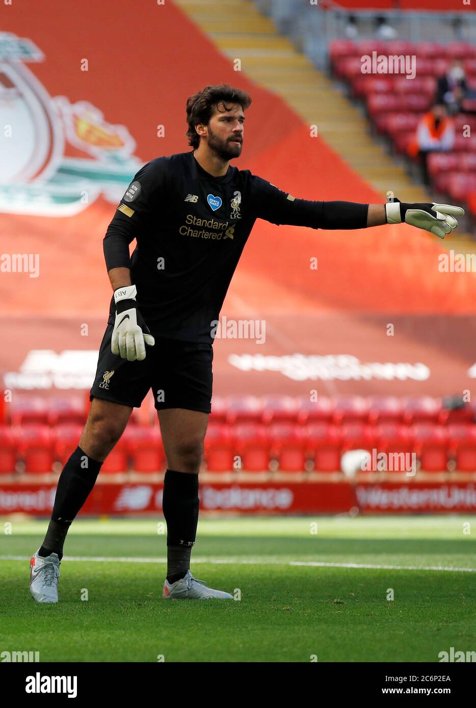 Liverpool goalkeeper Alisson gestures during the Premier League match ...