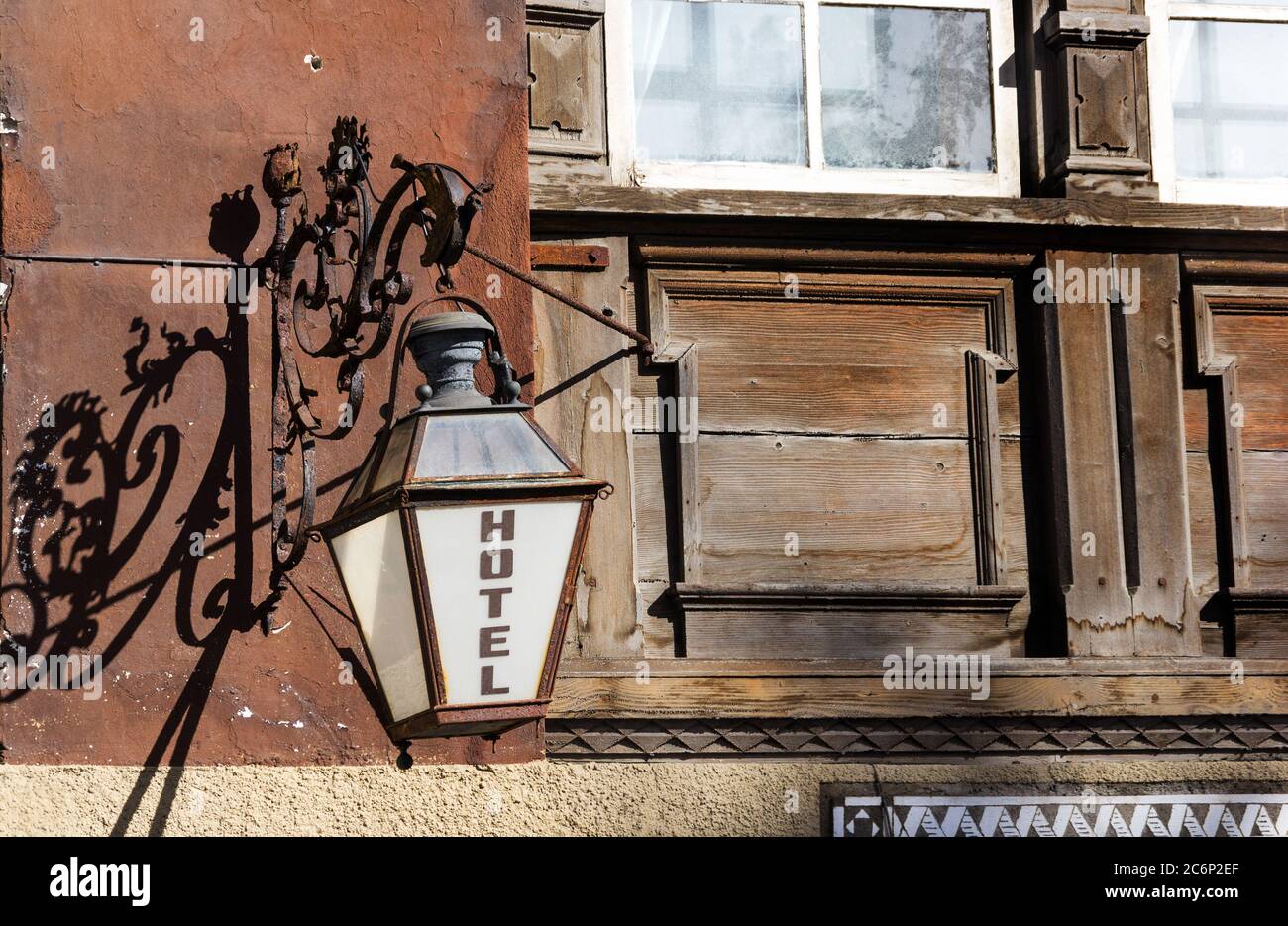 Vintage hotel sign on an old house with wooden window Stock Photo - Alamy