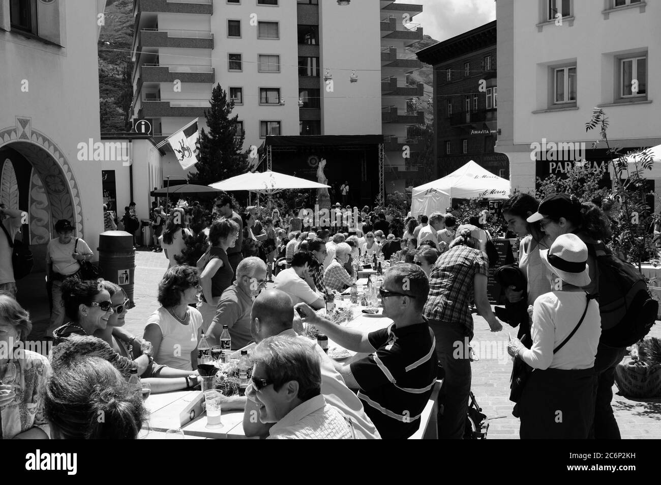 St. Moritz Food Festival: local people and tourists sitting outside and ...