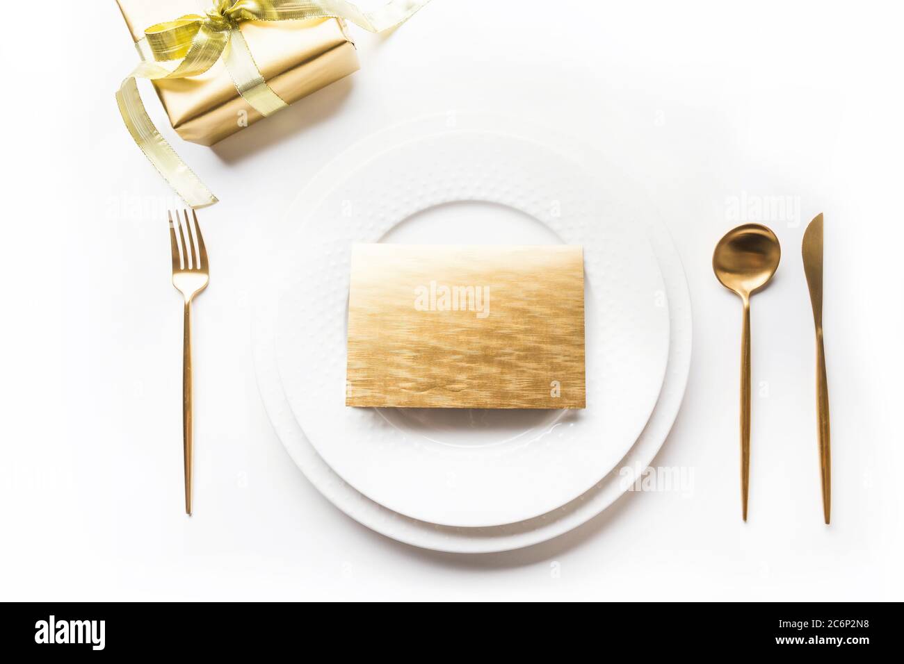 Gold silverware and plate Cut Out Stock Images & Pictures - Alamy