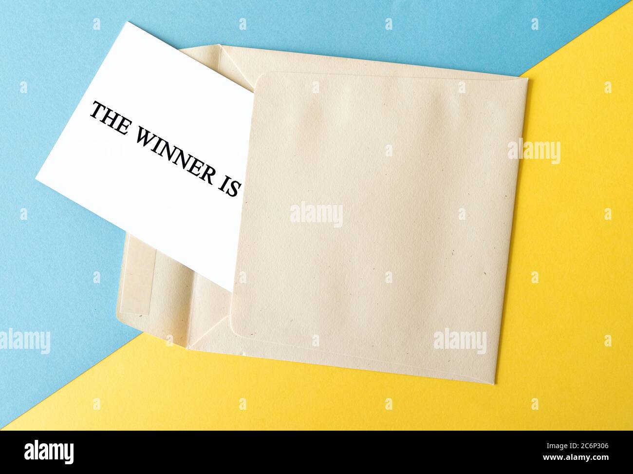 The winner is text with an envelope, competition and prize concept ...