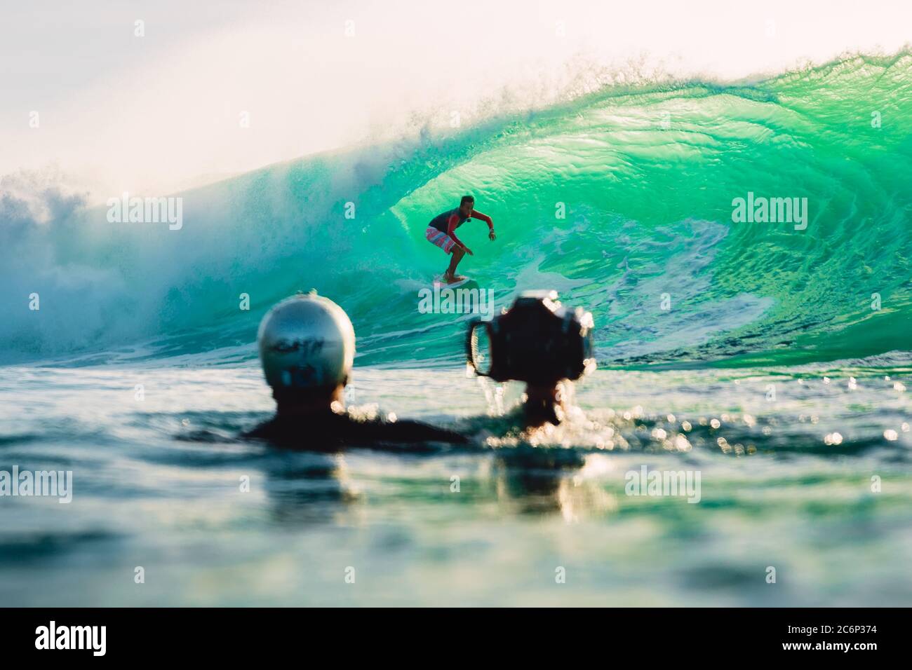 July 29, 2018. Bali, Indonesia. Surfer ride on barrel wave ...