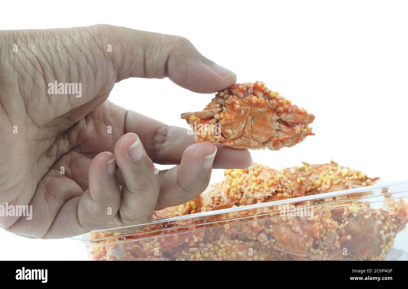 Cuisine and Food, Hand Holding Crispy Fried of Tiny Crabs Isolated on ...