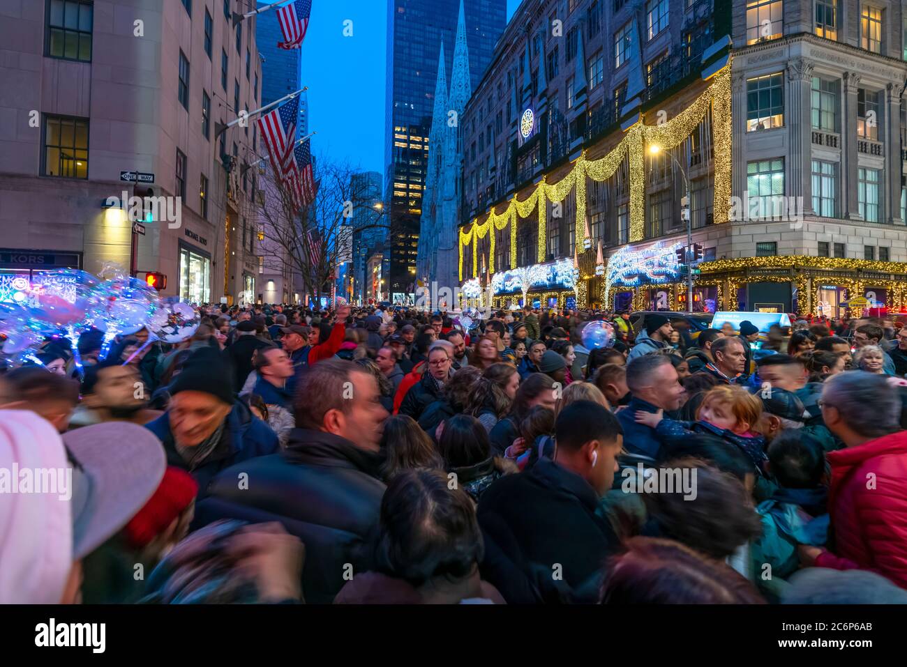Too much crowd of people stays to watch the SAKS FIFTH AVENUE Christmas ...