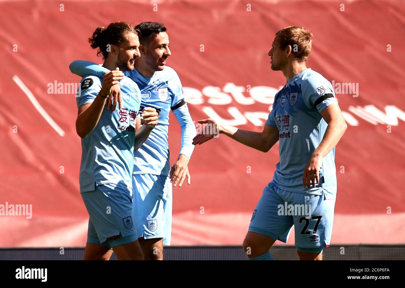 Burnley's Jay Rodriguez (left) celebrates scoring his side's opening ...