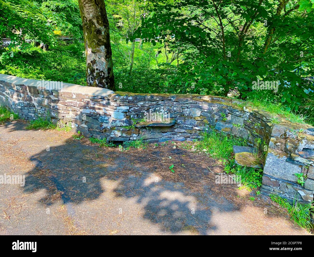 The old stone bridge crossing the Sulby River at Tholt-y-Will, in the ...