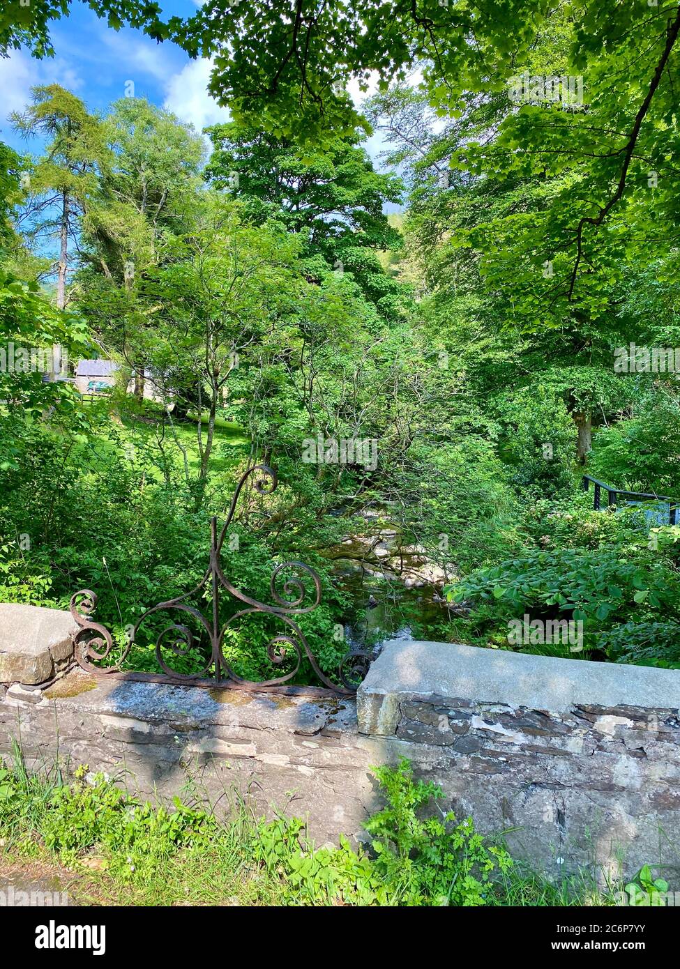 The old stone bridge crossing the Sulby River at Tholt-y-Will, in the ...