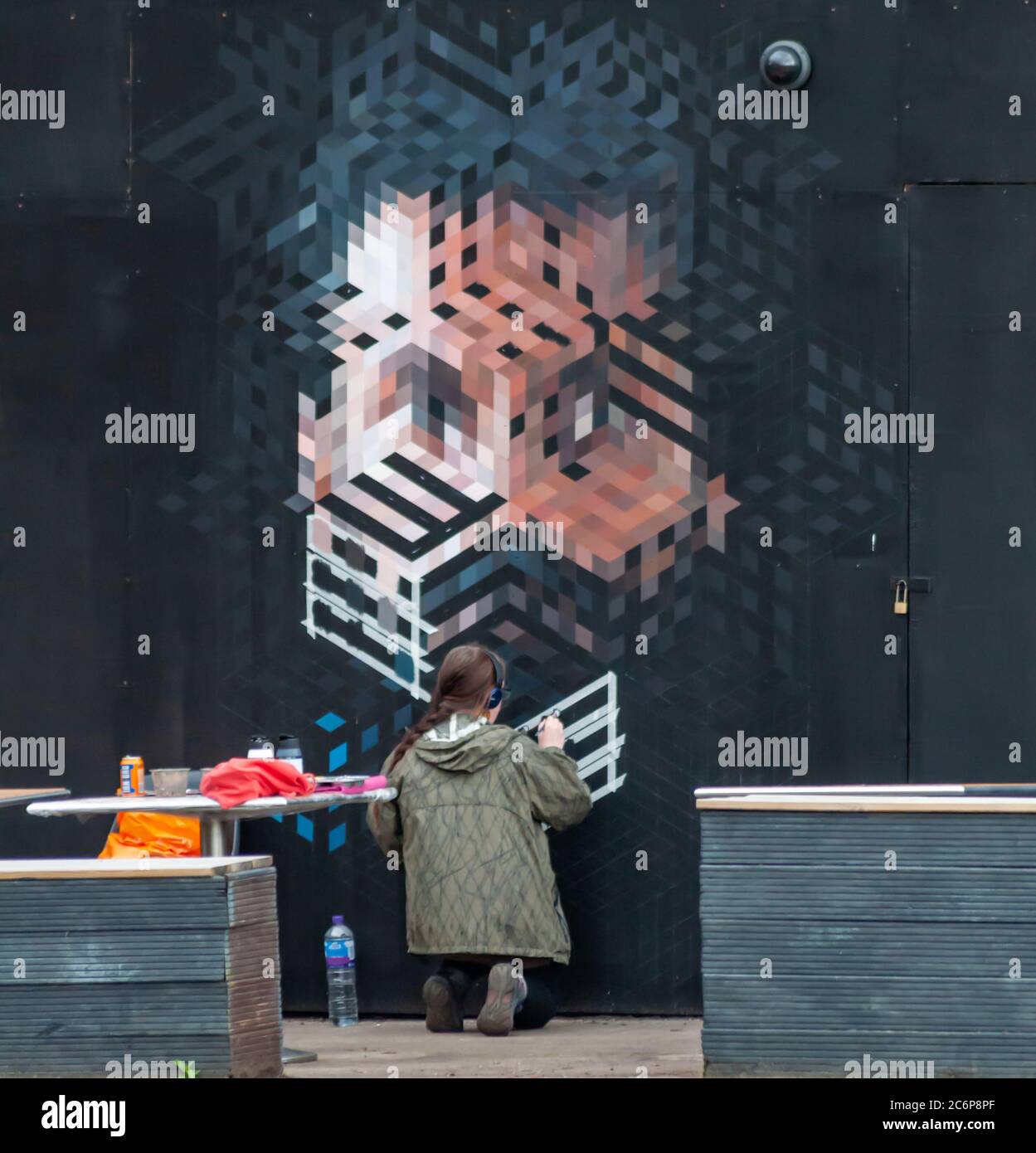 Glasgow, Scotland, UK. 11th July, 2020. An artist at work on a new ...