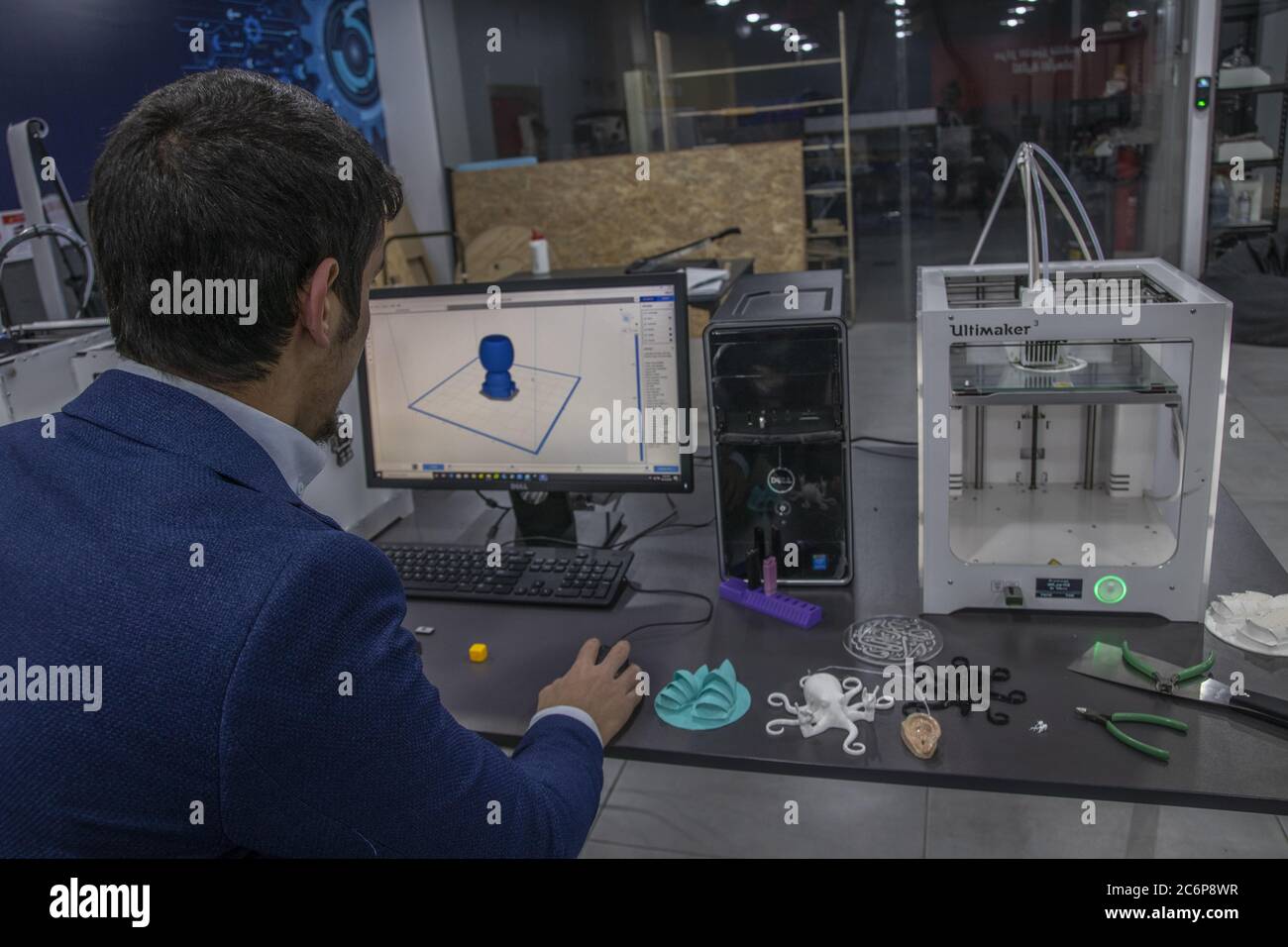 An adult who designing products by using 3D print in Jordan Stock Photo ...