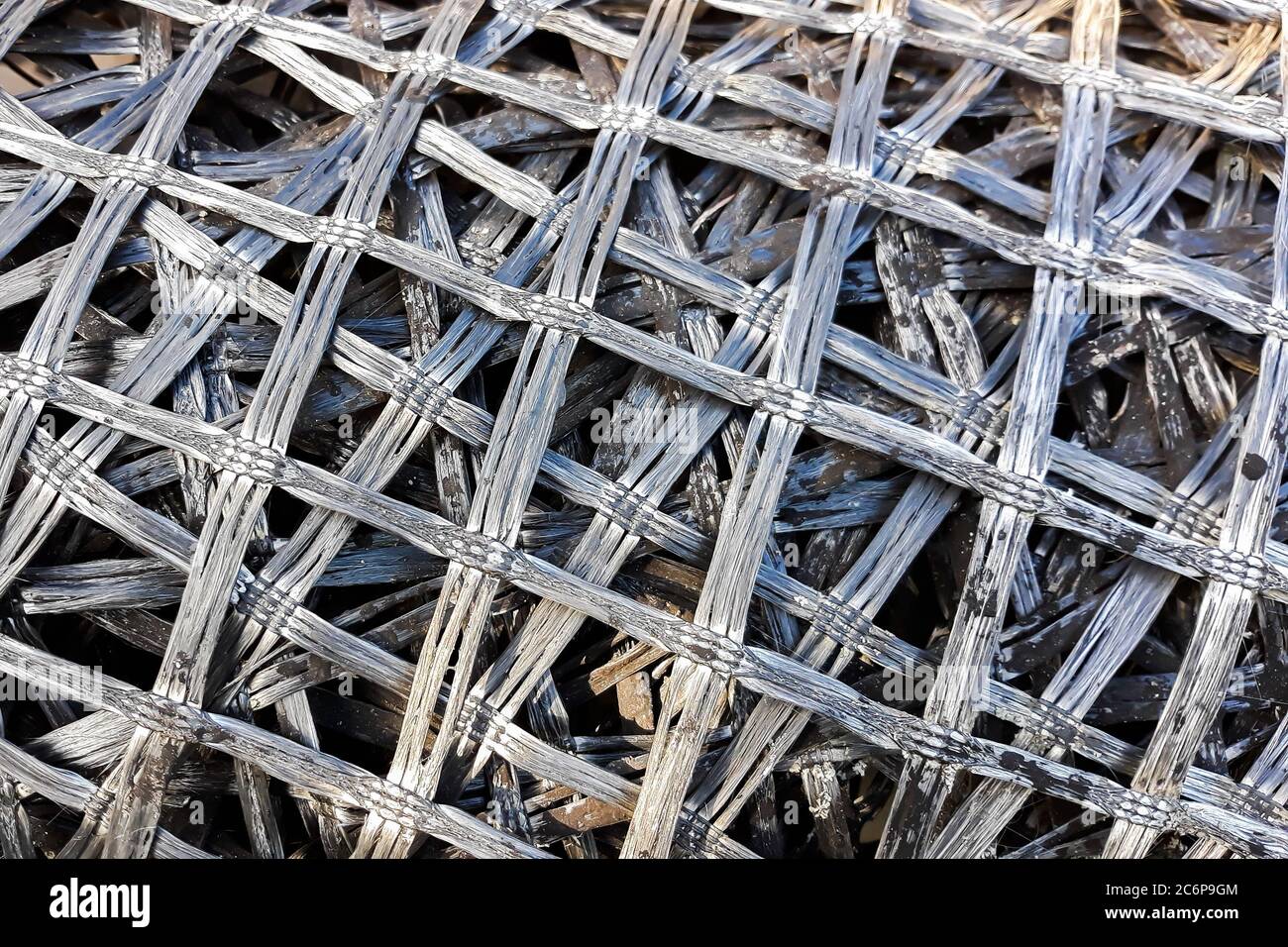 Texture of a construction rubber mesh closeup Stock Photo - Alamy