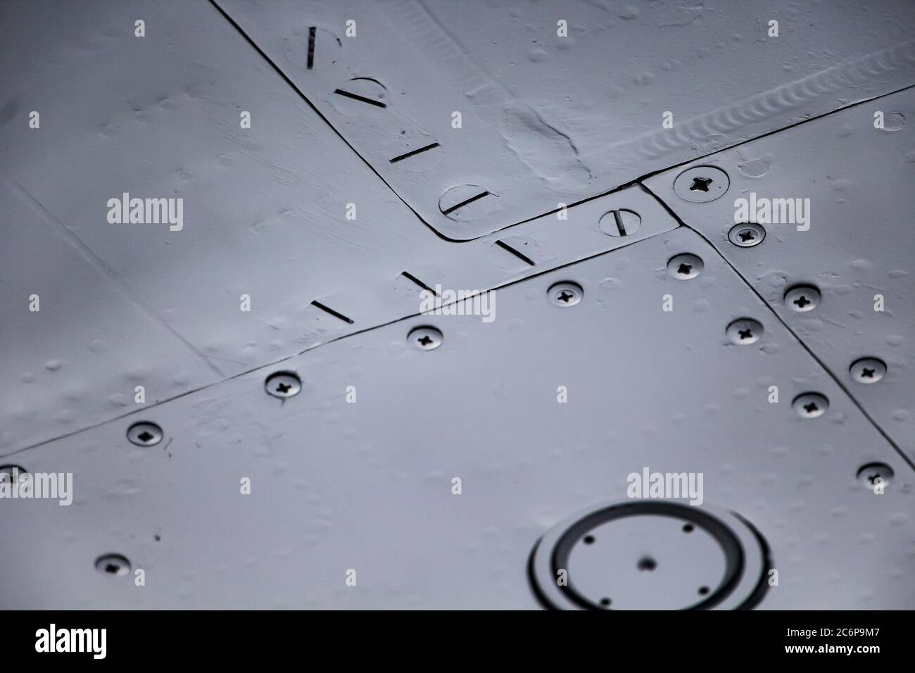 Aircraft skin close up. Rivets on gray metal. Aluminum texture Stock ...
