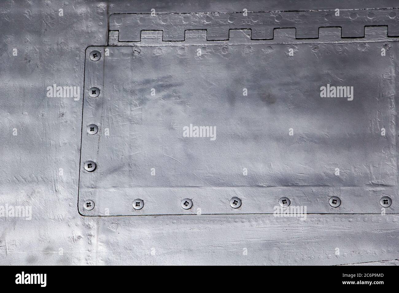 Aircraft skin close up. Rivets on gray metal. Aluminum texture Stock ...