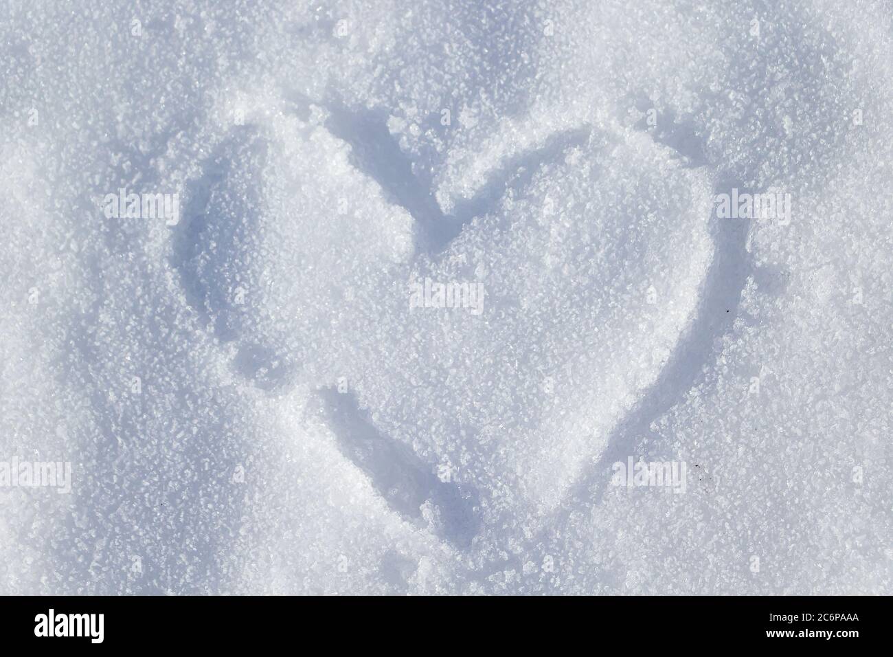 Heart painted on snow, a symbol of love and valentine's day Stock Photo ...