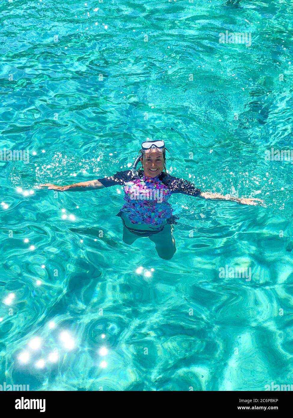 Woman swimming in crystal hi-res stock photography and images - Alamy