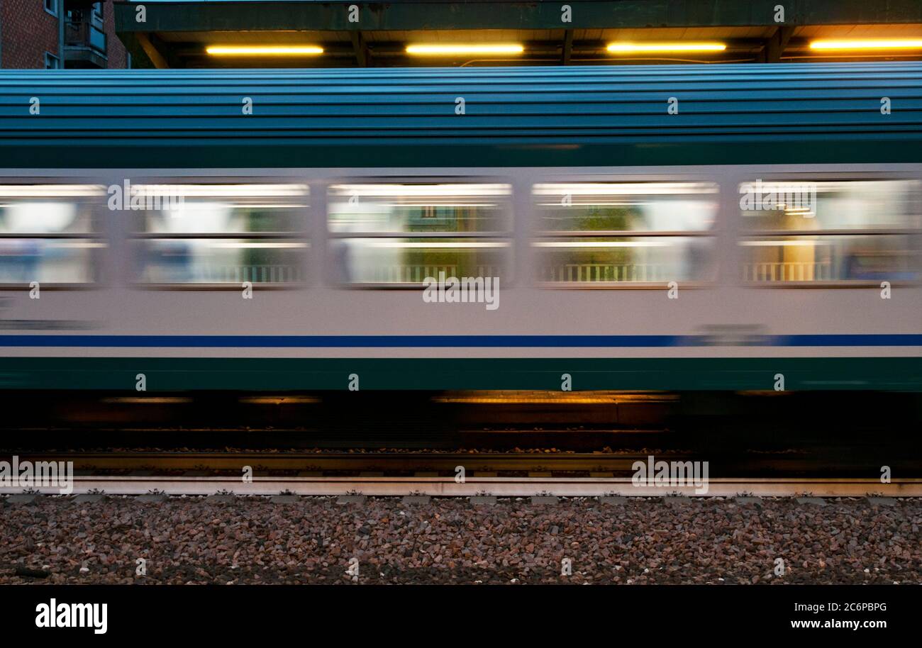Train wagon blur image in early evening Stock Photo - Alamy