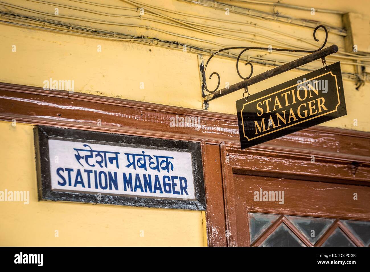 Train station manager sign at Darjeeling, India Stock Photo - Alamy