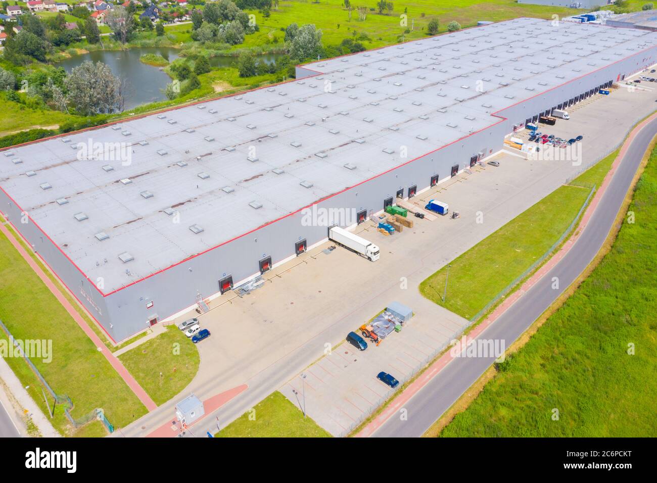 Aerial top view of the large logistics park with warehouse, loading hub ...