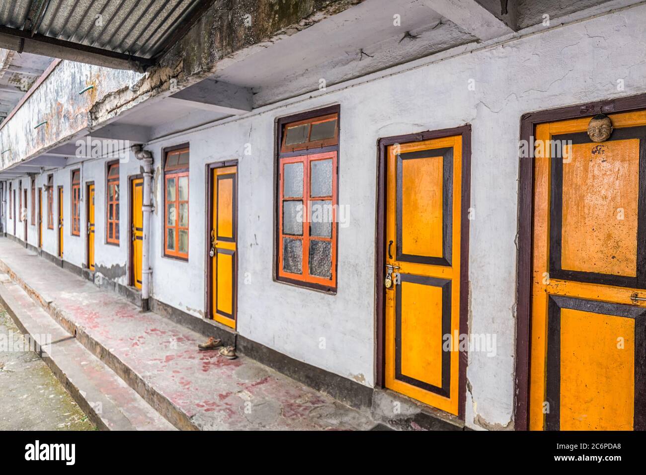 Buddhist monks quarters with yellow doors at monastery Darjeeling ...