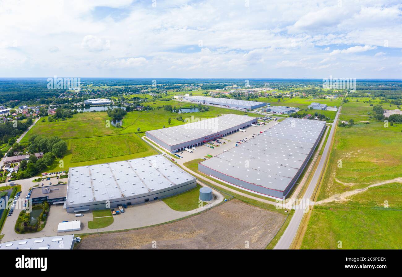 Aerial Top View of Industrial Storage Building Area with Solar Panels ...