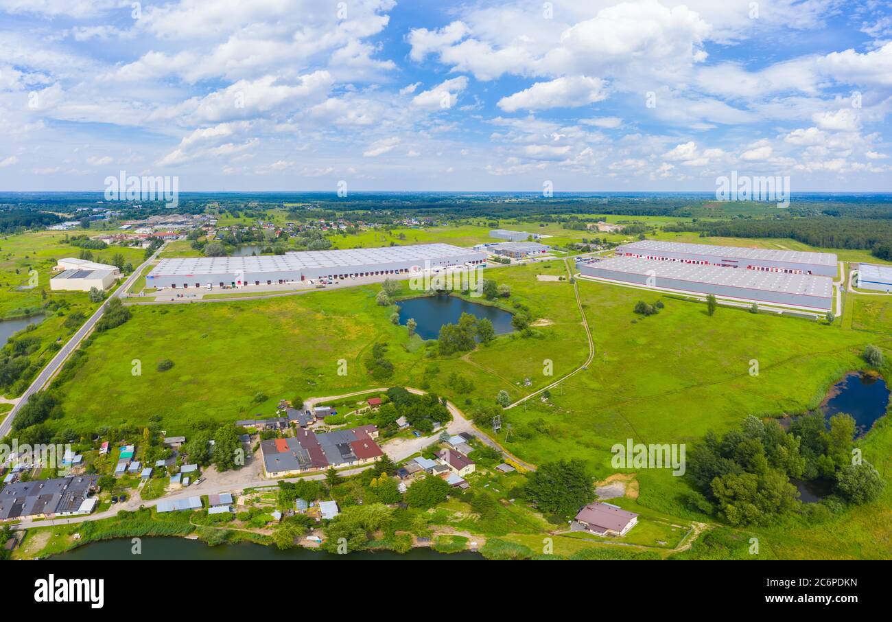 Aerial Top View of Industrial Storage Building Area with Solar Panels ...