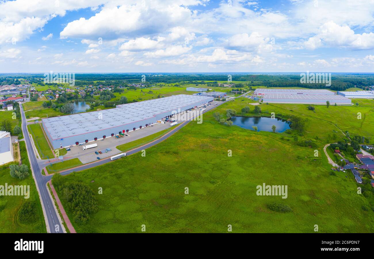 Aerial Top View of Industrial Storage Building Area with Solar Panels ...