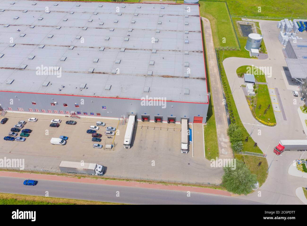 Aerial Top View of Industrial Storage Building Area with Solar Panels ...