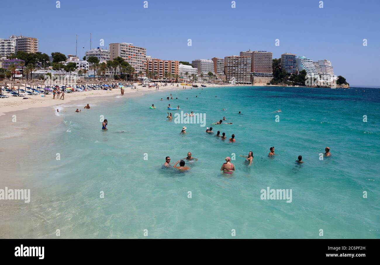 Sunbathing on magaluf beach hi-res stock photography and images - Alamy